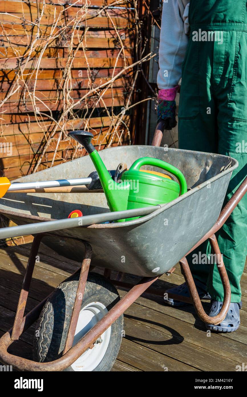 Garden tools in a wheelbarrow 09 Stock Photo - Alamy