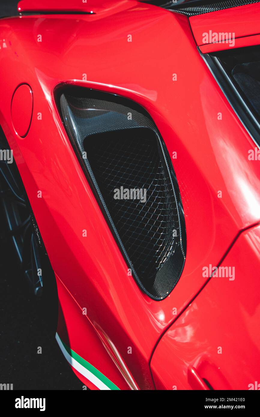 A vertical closeup of a red Ferrari at a car meet in Derbyshire Stock ...