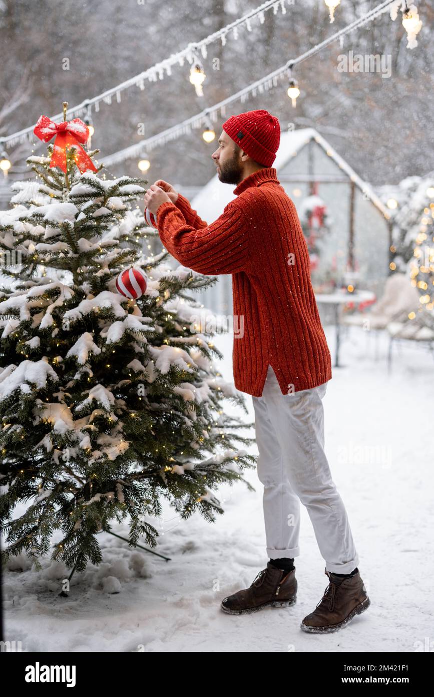 Young man hanging tree hi-res stock photography and images - Alamy