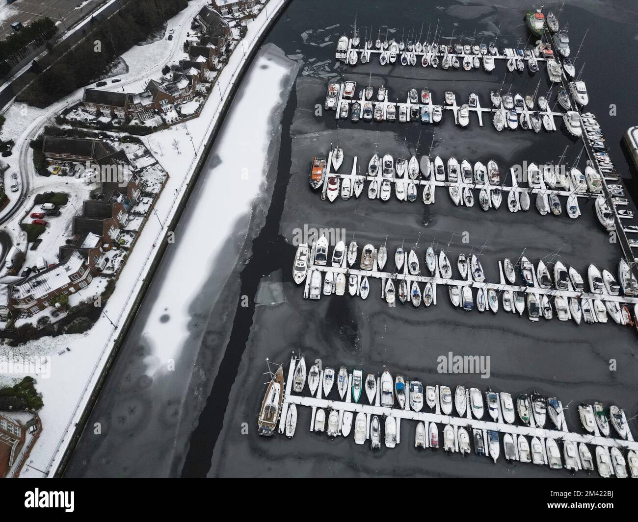 Boats in the frozen Royal Quays Marina at North Shields, North Tyneside ...