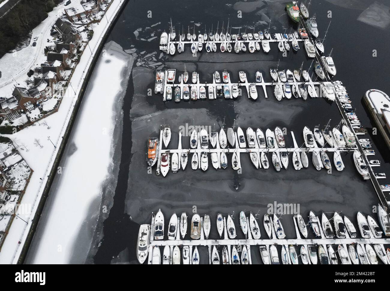 Boats in the frozen Royal Quays Marina at North Shields, North Tyneside ...