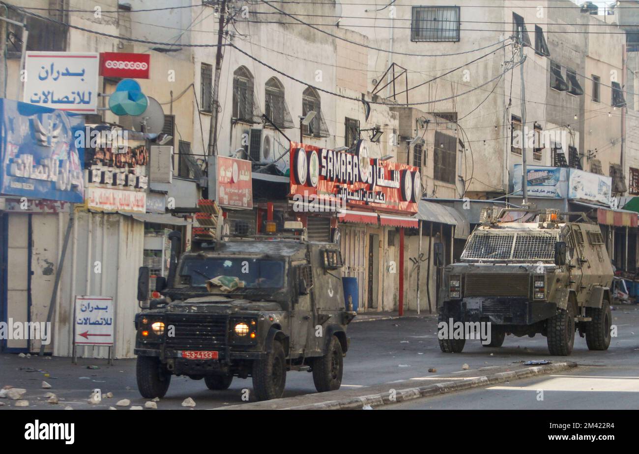Military vehicles of the Israeli army seen at the Askar refugee camp ...