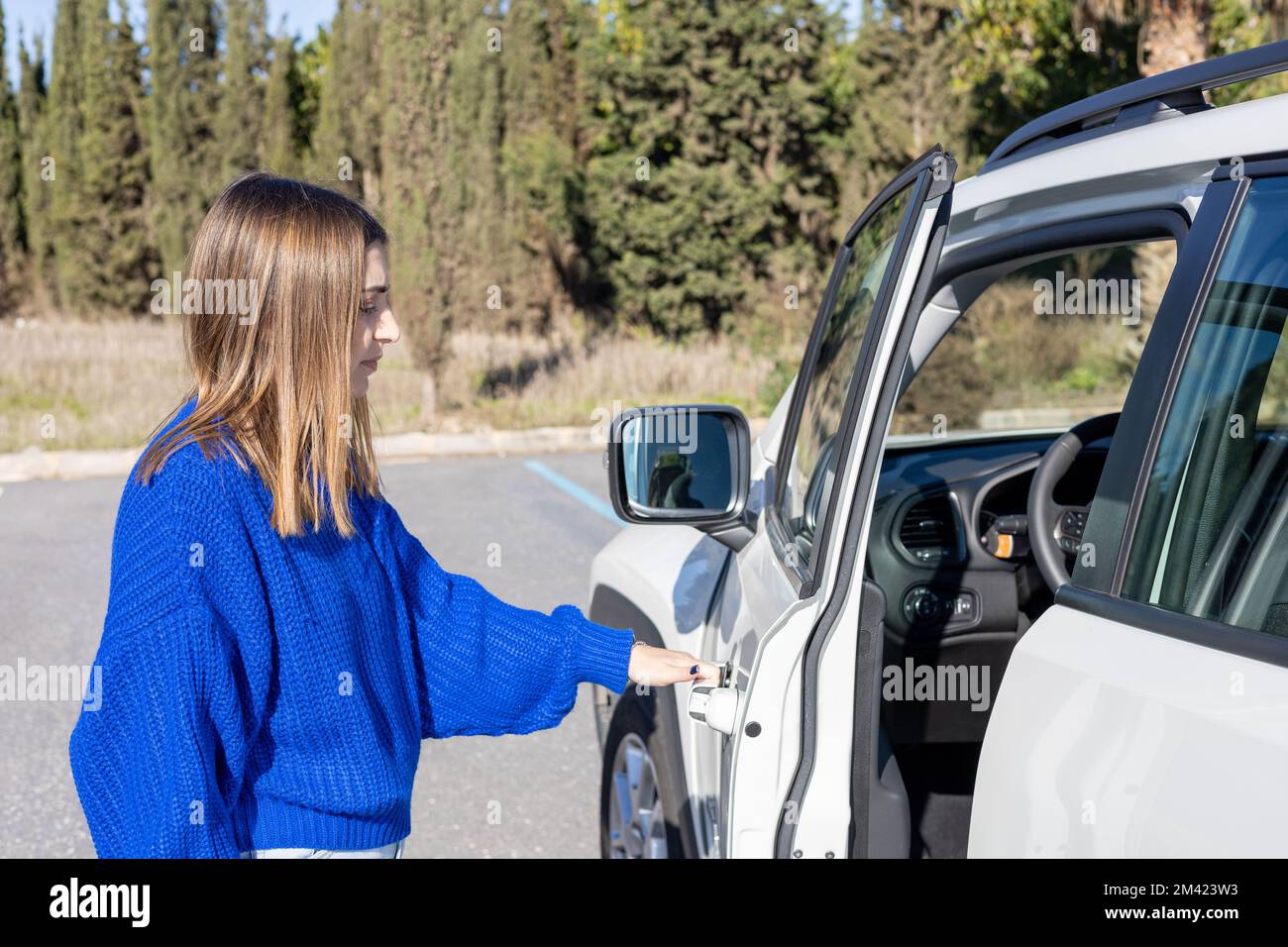 Woman car door hi-res stock photography and images - Alamy