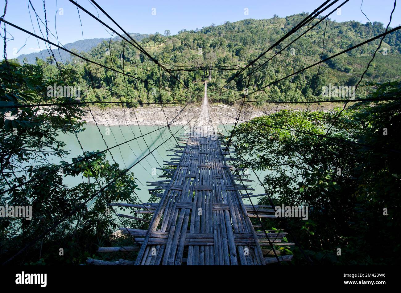 A 300 m long hanging bridge crosses the mighty river Siang in the hills ...