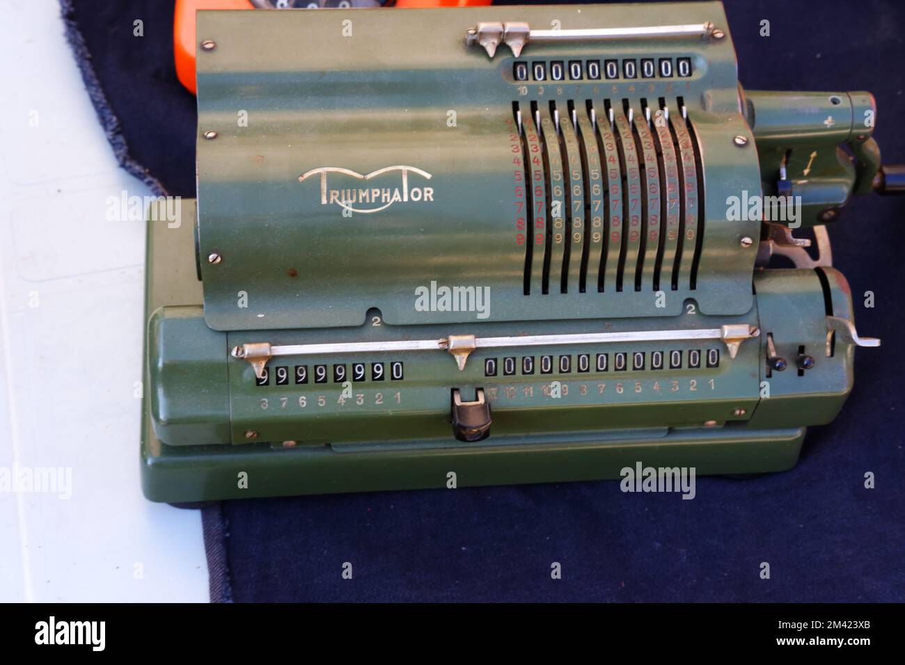 Ancient calculator machine on table for exhibition Stock Photo - Alamy