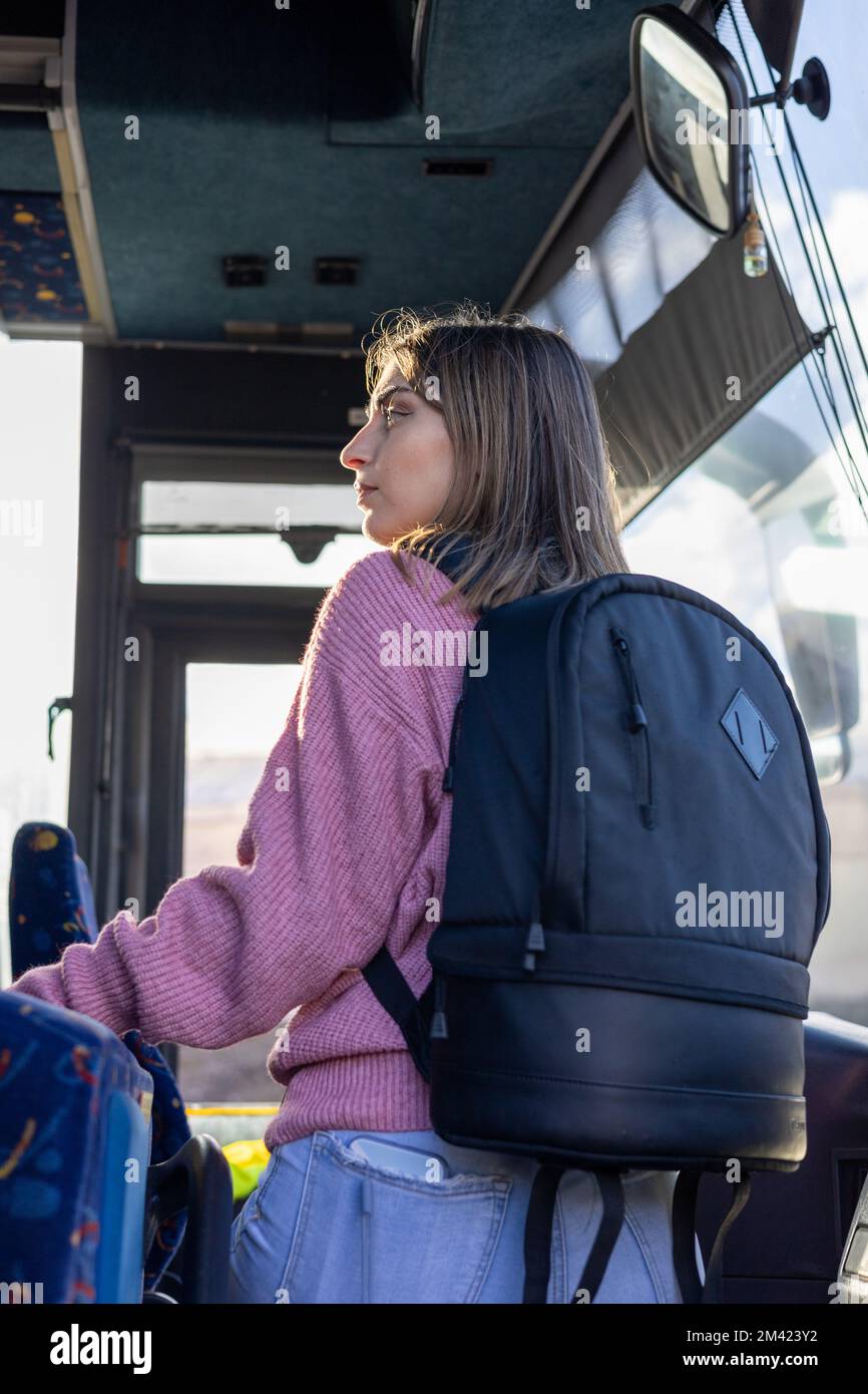 Beautiful young woman enjoying the travel on bus or train - wanderlust ...
