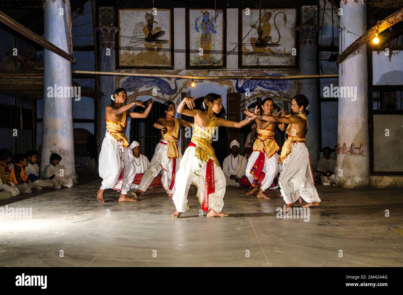Monks of one of the Sattras, the Vaishnava Monasteries on Majuli Island, performing a ritual ...