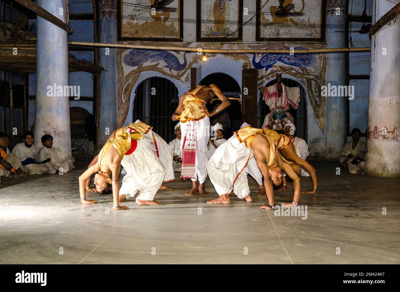 Monks of one of the Sattras, the Vaishnava Monasteries on Majuli Island, performing a ritual ...