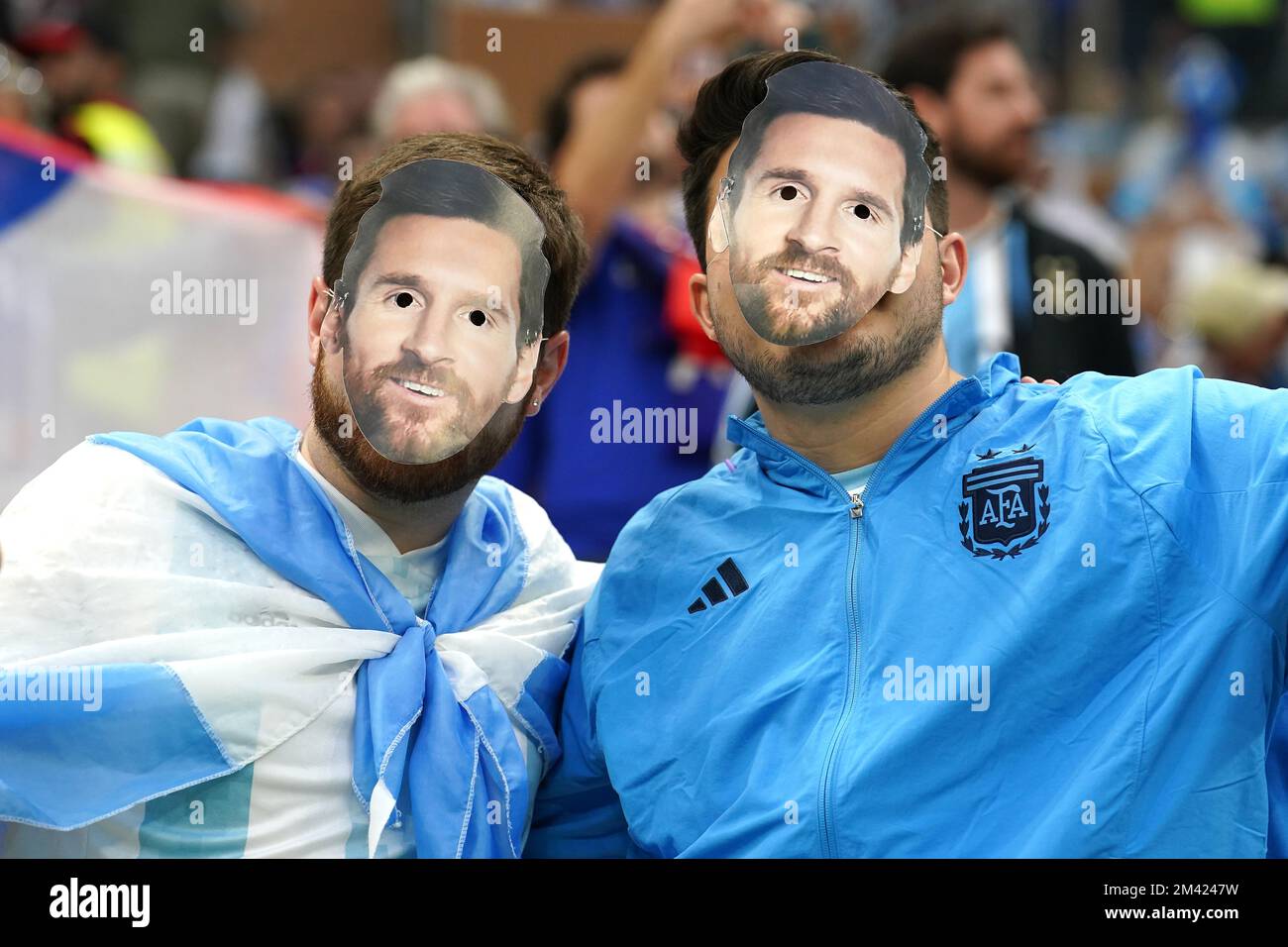 Argentina fans wearing face masks of Argentina's Lionel Messi before ...