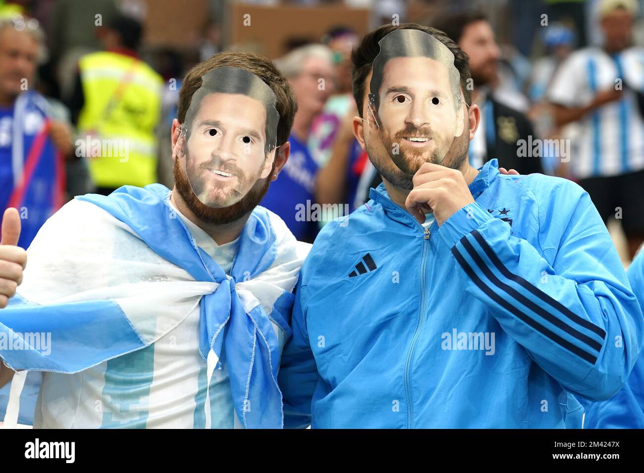 Argentina fans wearing face masks of Argentina's Lionel Messi before ...