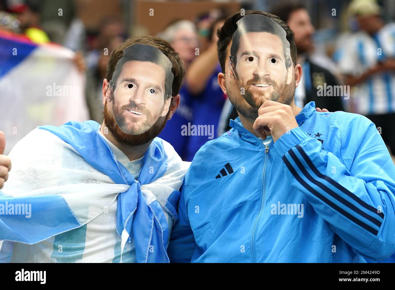 Argentina fans wearing face masks of Argentina's Lionel Messi before ...