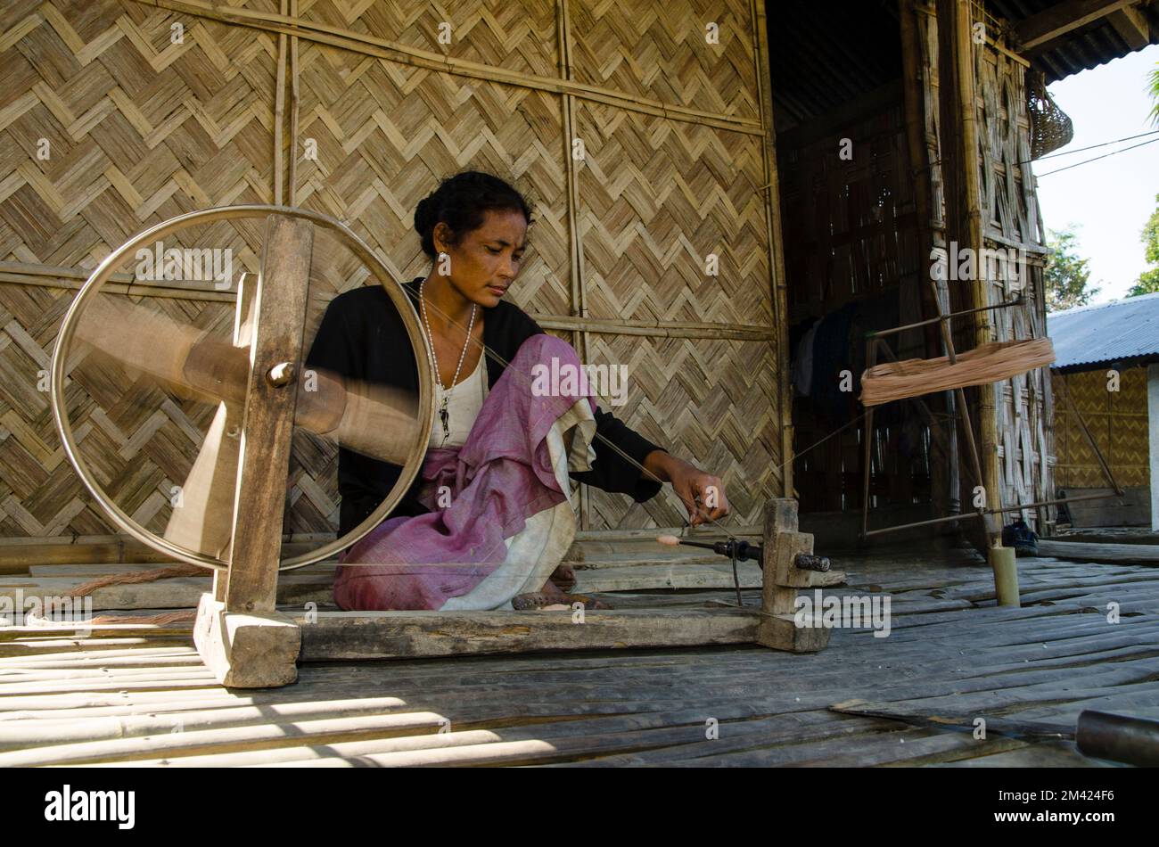 Lady spinning wool spinning wheel hi-res stock photography and images ...