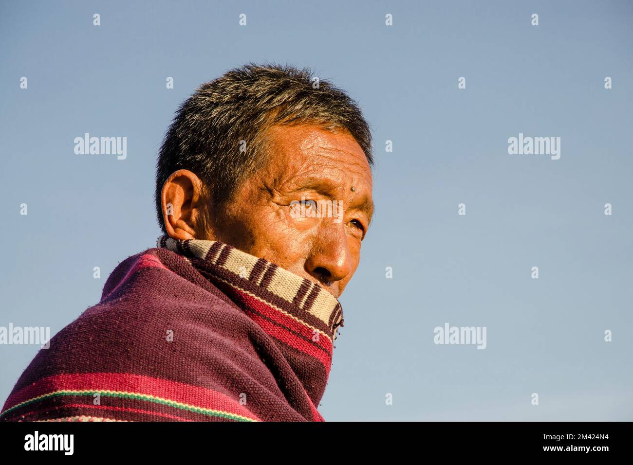 Old man of the Angami tribe in front of his house in Zakhama Village ...