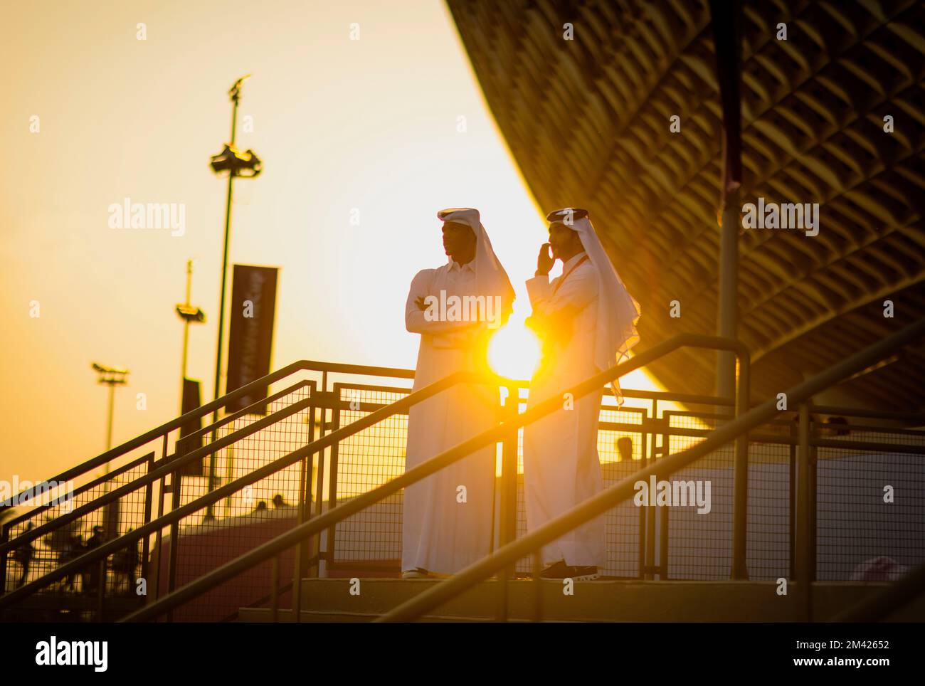 Doha, Qatar. 18th Dec, 2022. Sheiks in the sunset in front of the ...