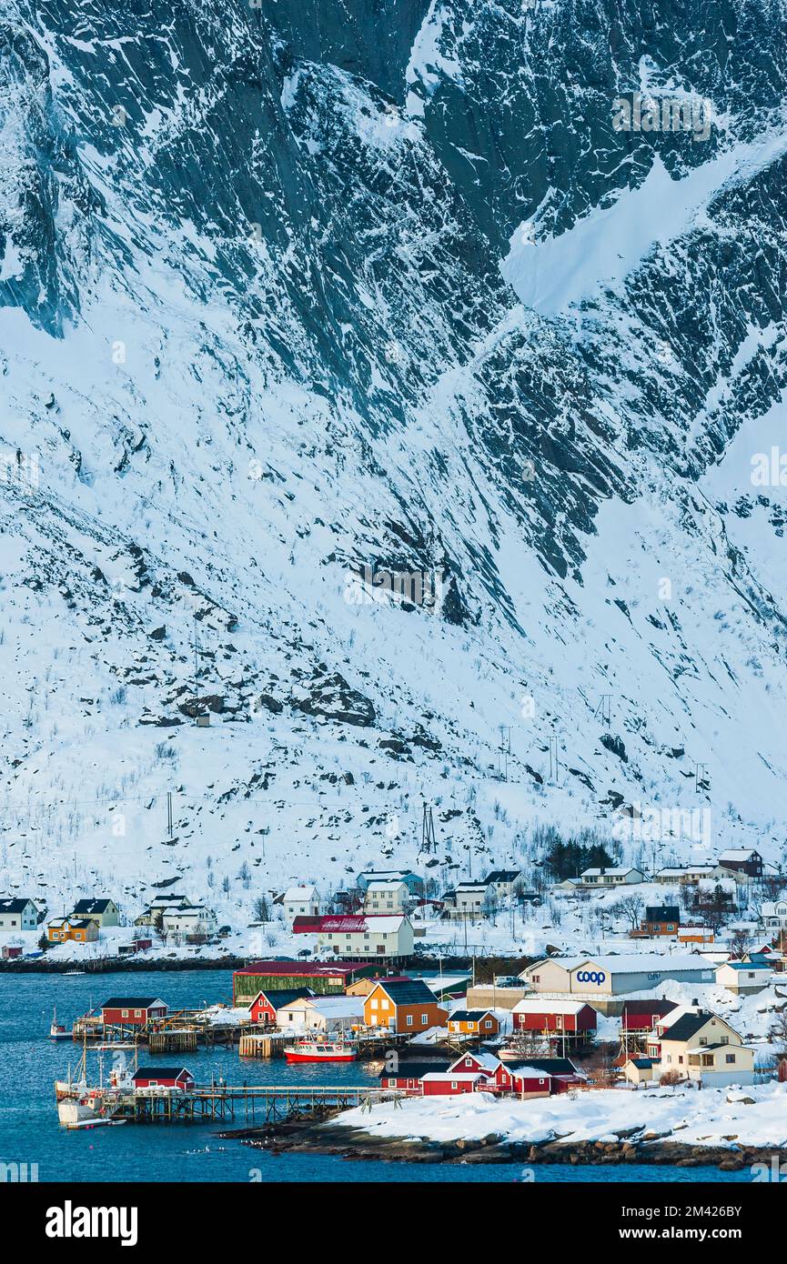 Buildings in front of snow covered mountains, Norway Stock Photo - Alamy