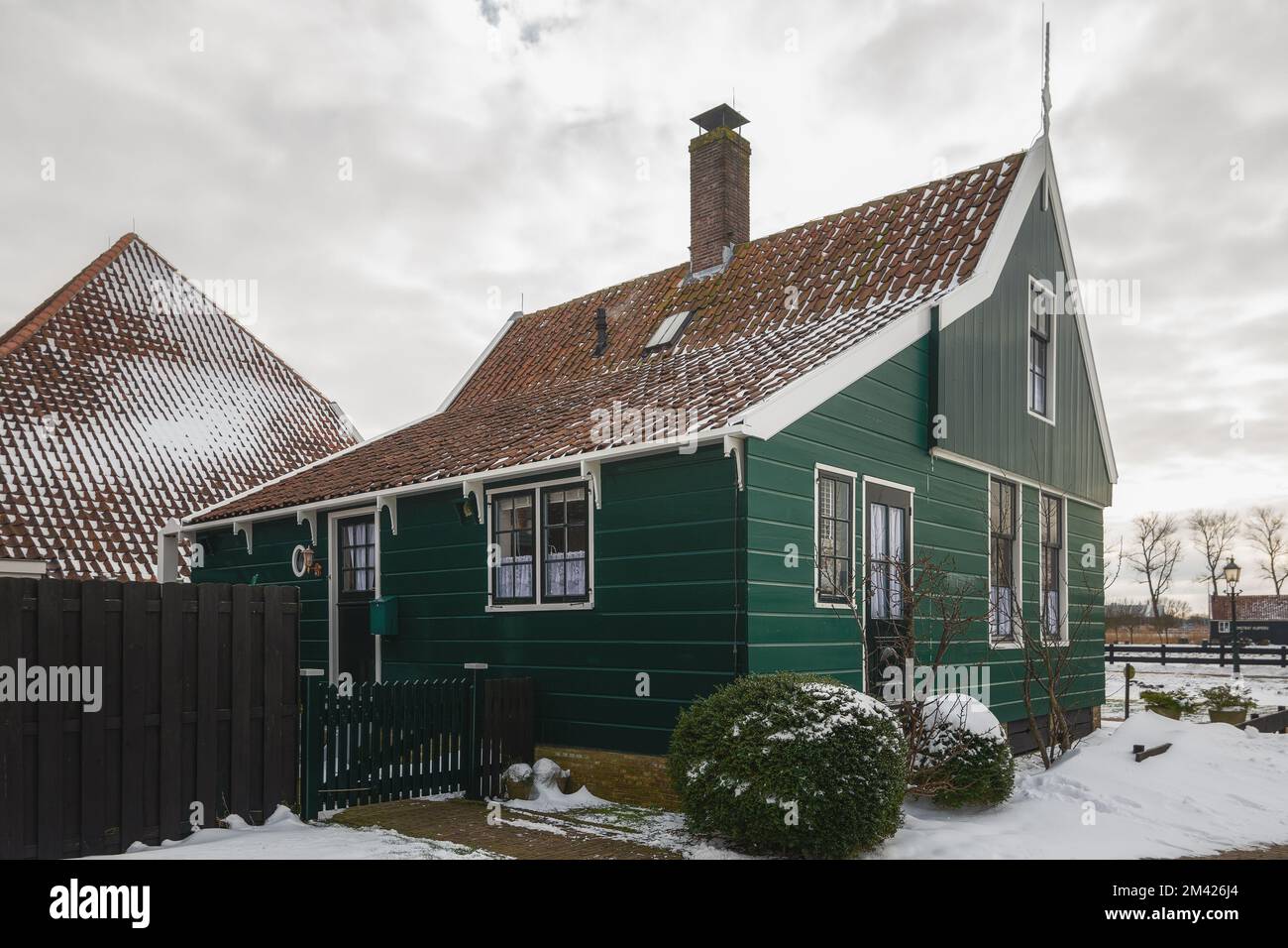 Traditional, green, wooden, Dutch house in the small village of Zaanse ...