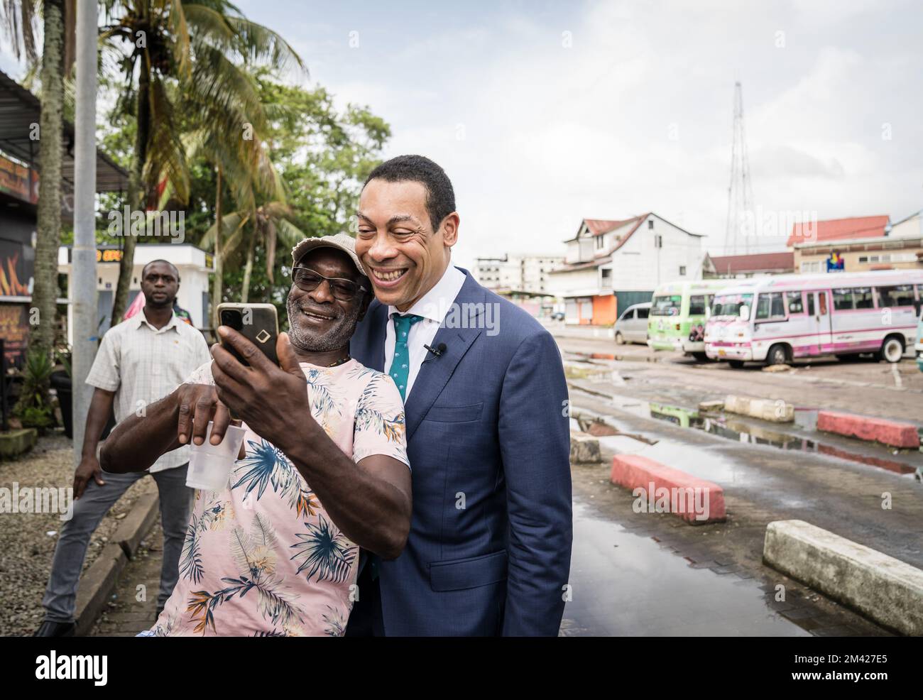 PARAMARIBO - Franc Weerwind, Minister for Legal Protection, takes a selfie with a man on the ...