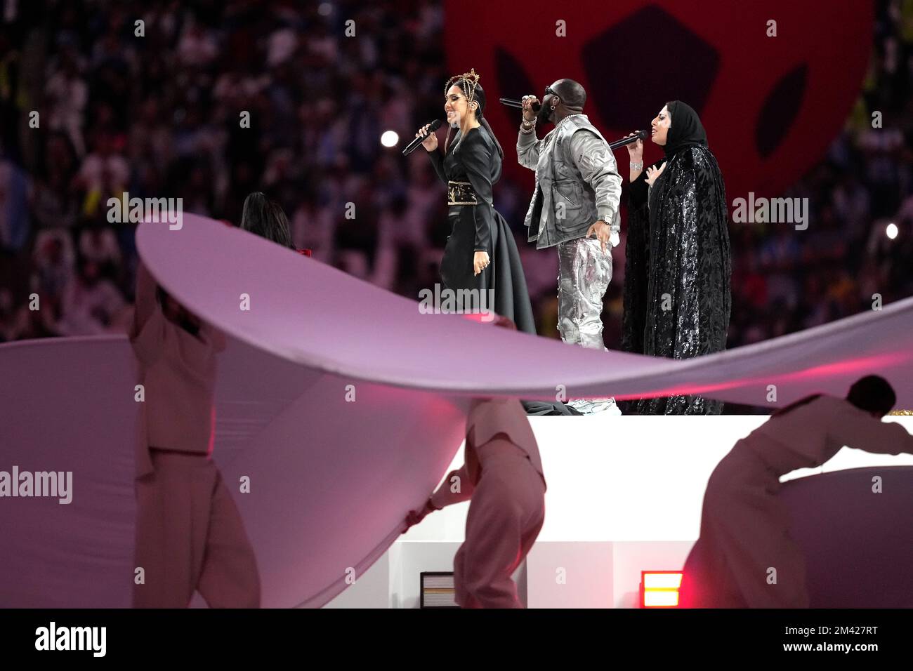 Performers Manal (left), Davido and Aisha during the closing ceremony ...