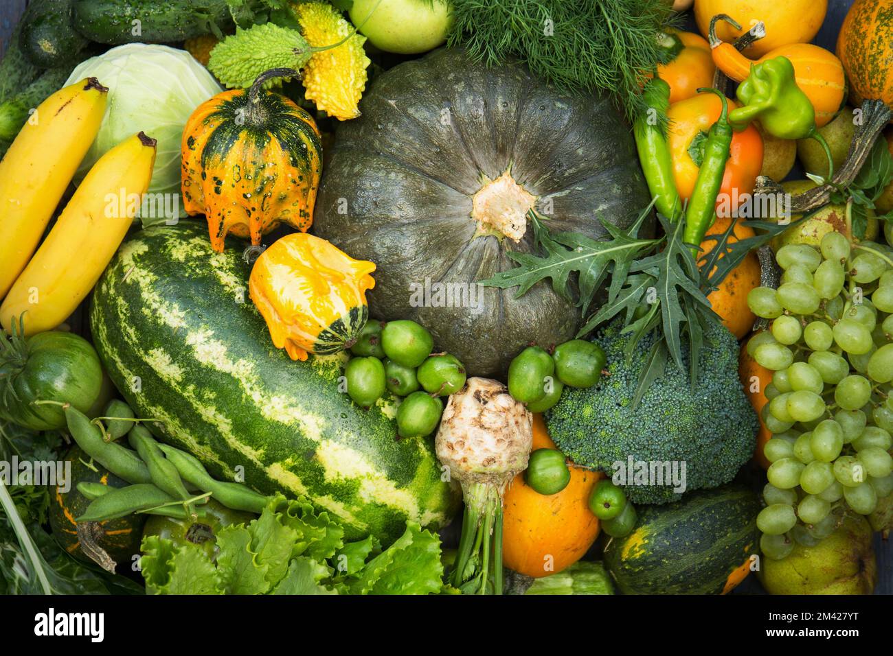 Background of green and yellow vegetables and fruits Stock Photo - Alamy