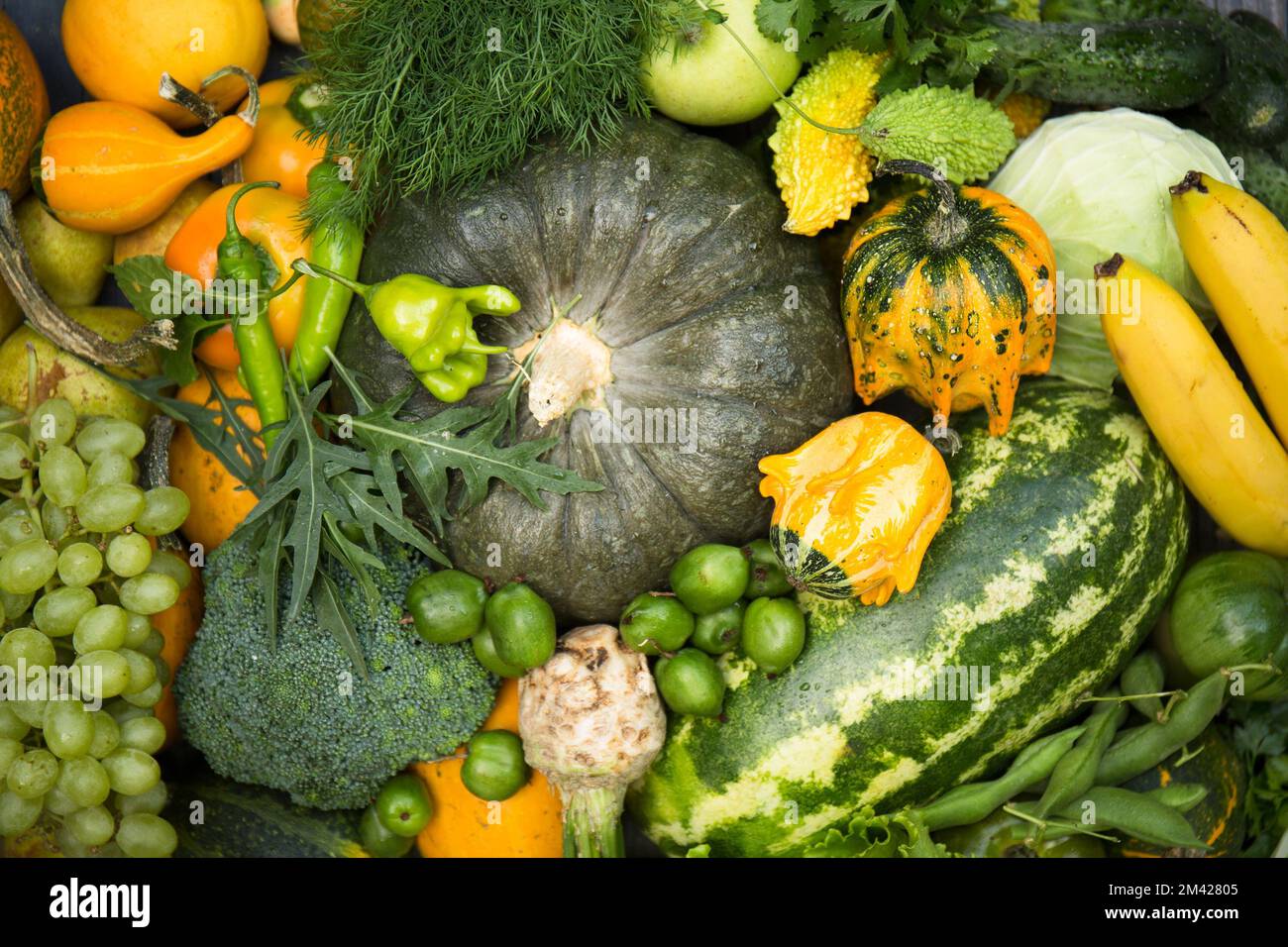 Background of green and yellow vegetables and fruits Stock Photo - Alamy
