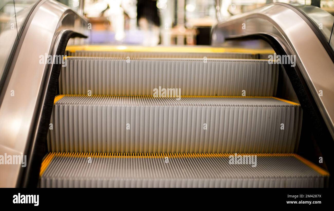 Stairs escalator close up in mall with selective focusing Stock Photo ...