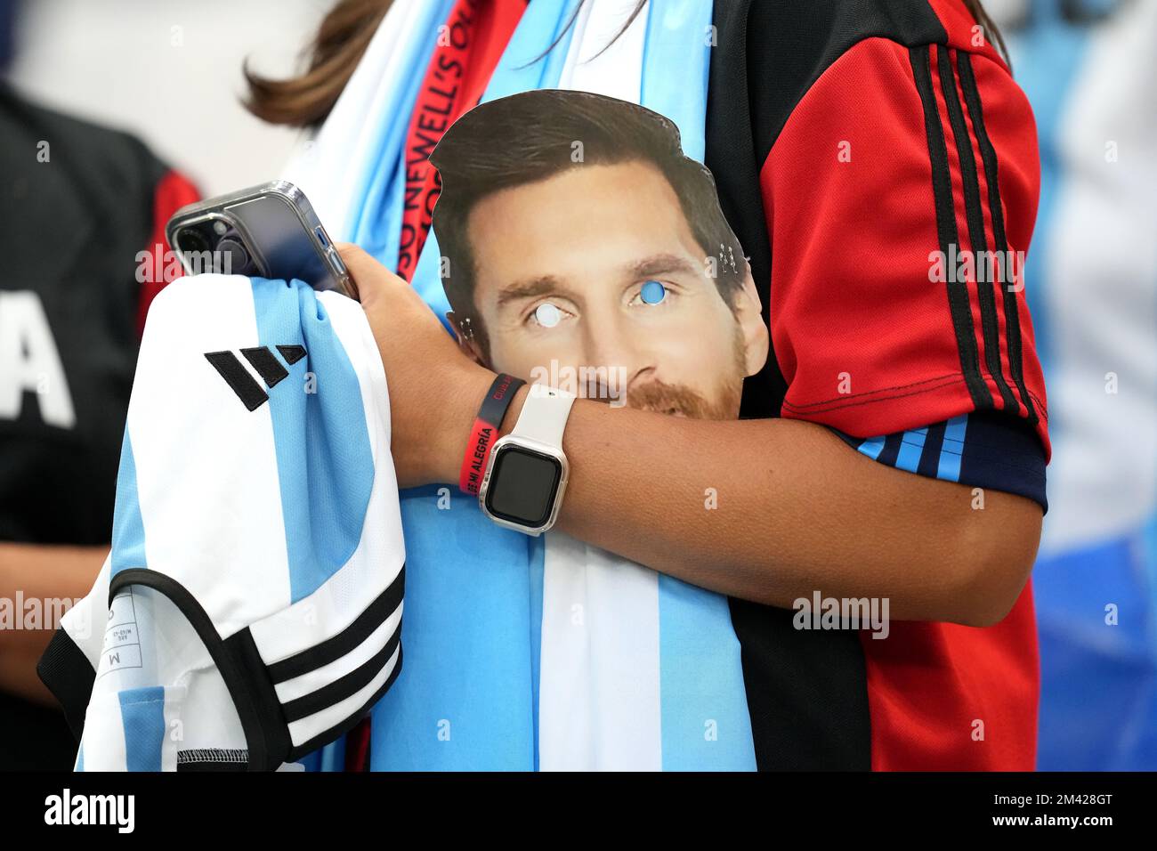 Argentina fans wearing face masks of Argentina's Lionel Messi before ...