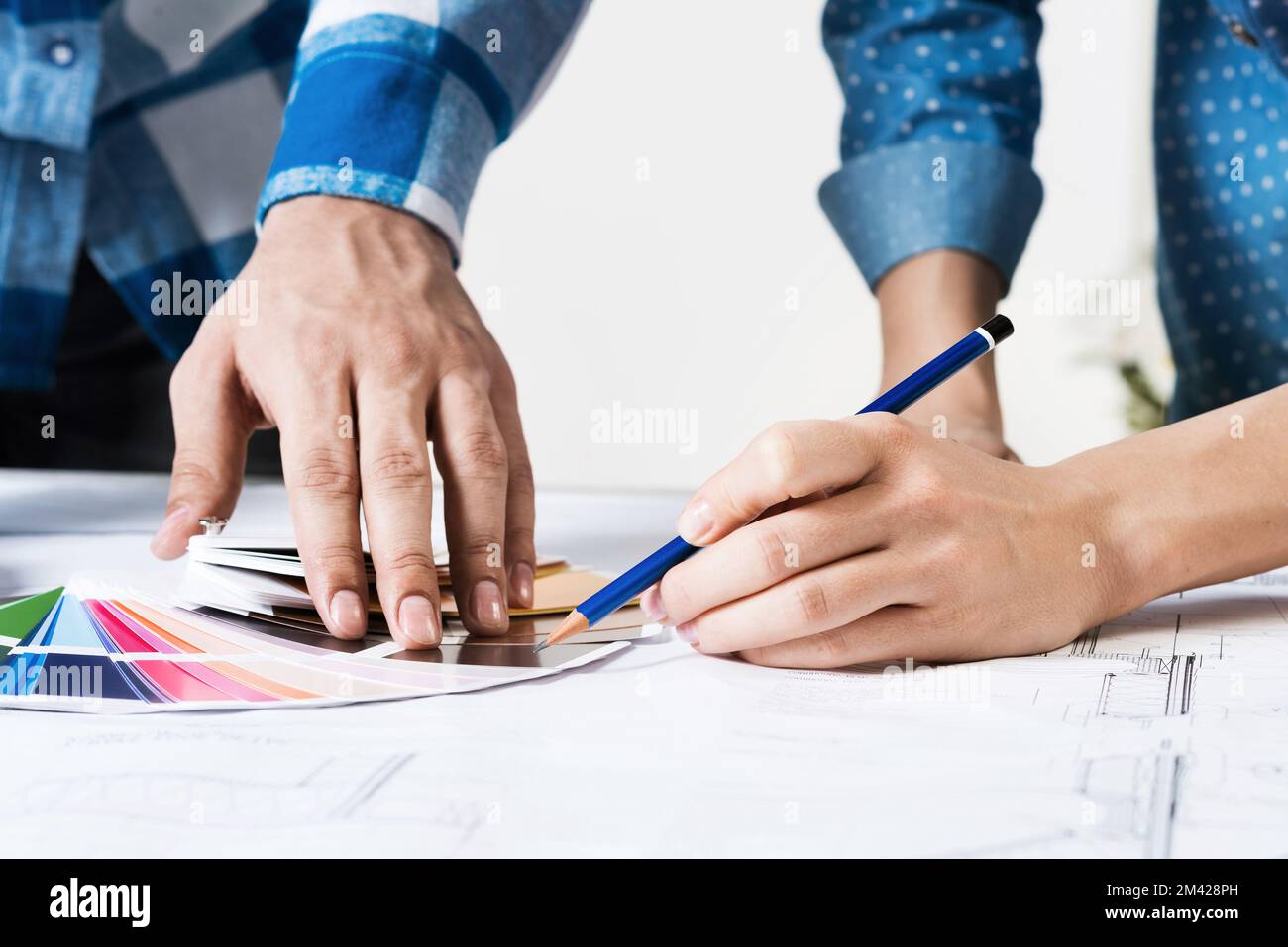 Designers selecting color palette for project Stock Photo - Alamy