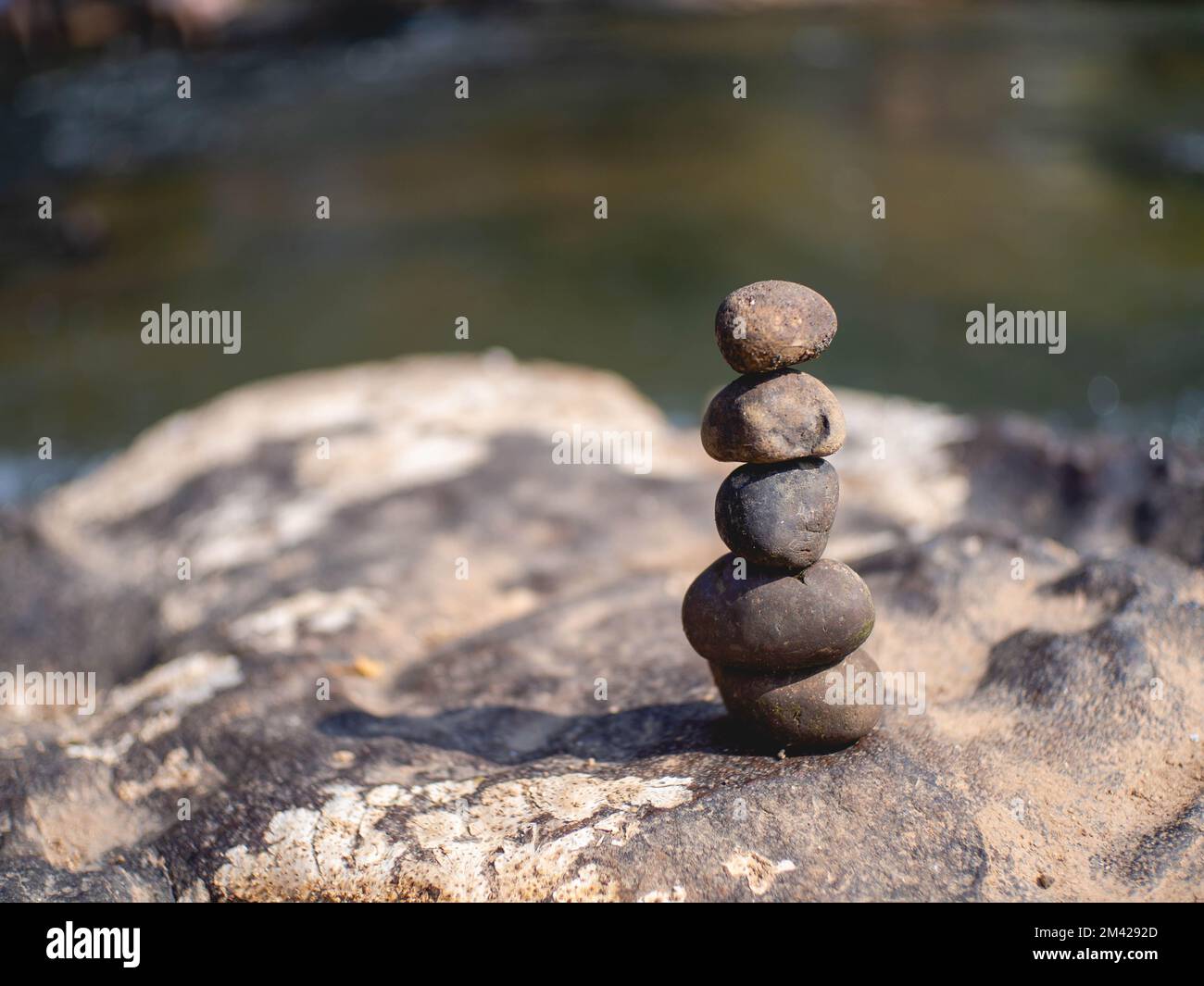 Stacked stones, leaves and nature at nature park, Wong Thong ...