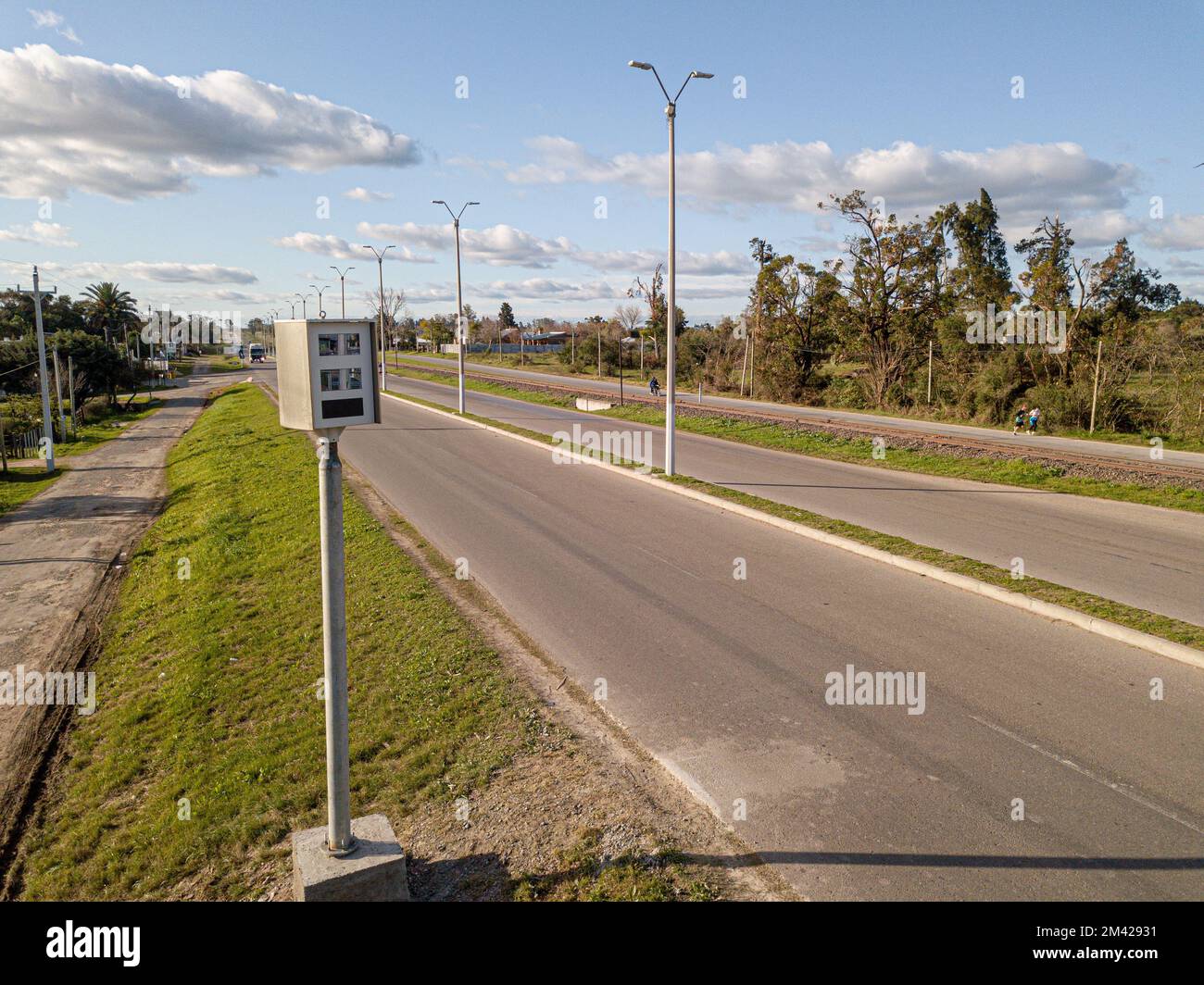 A speed radar on the pole at the road Stock Photo - Alamy