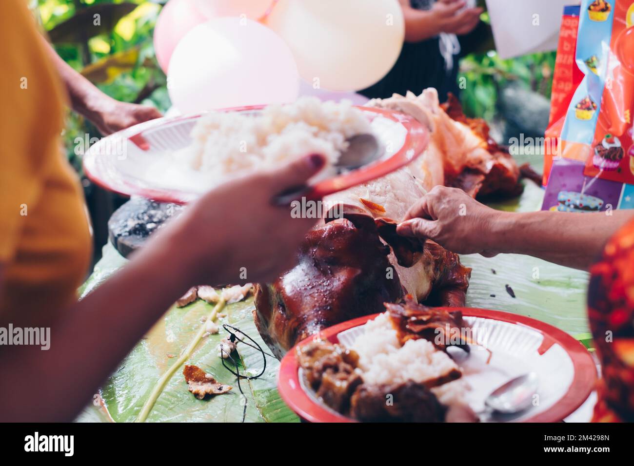 Butcher slicing into pieces the all-time favorite, the popular ...