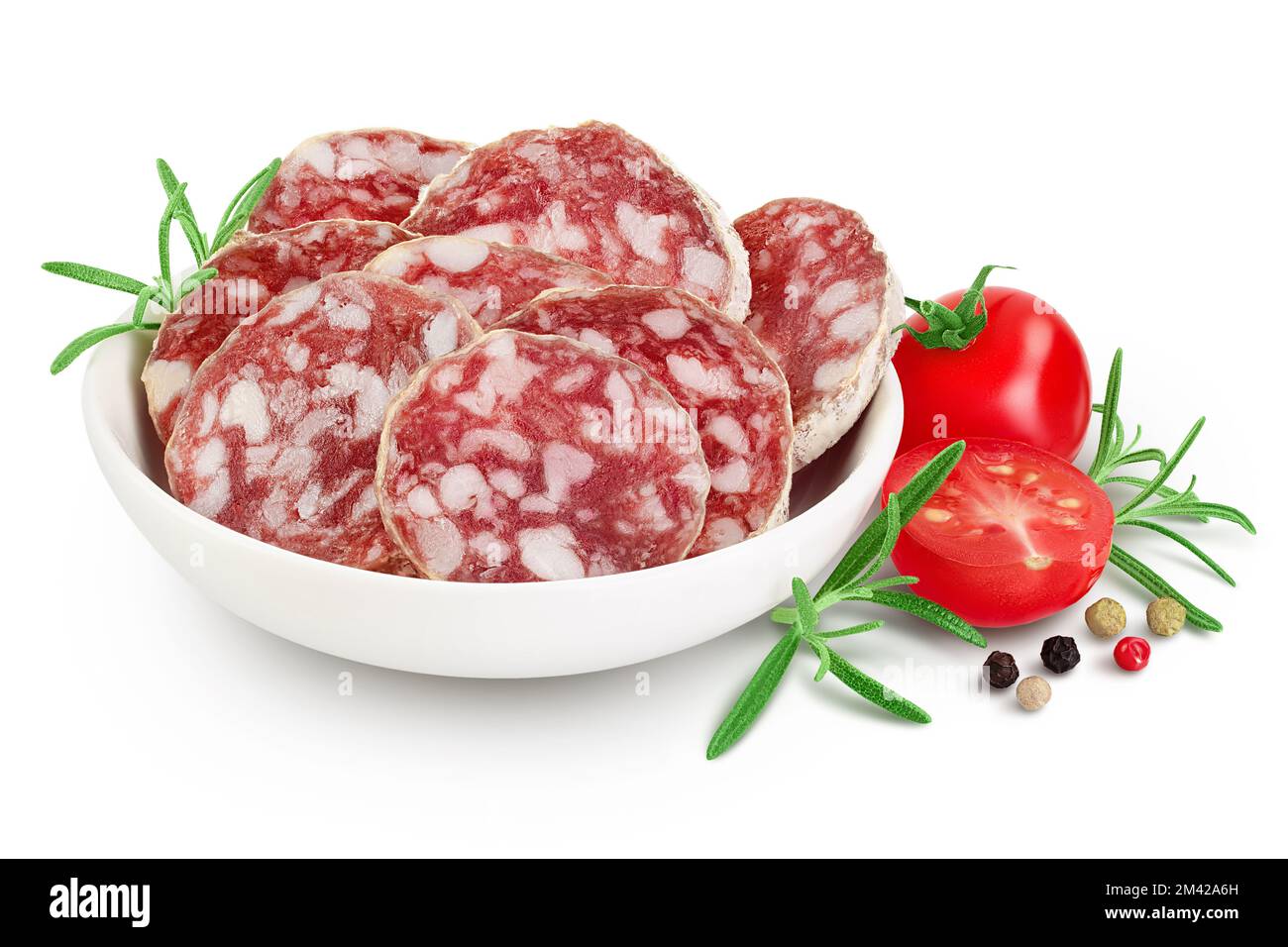 Cured salami sausage in ceramic bowl isolated on white background ...