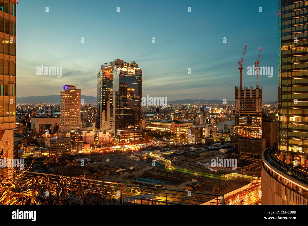 Osaka, Japan - November 18, 2022: Evening lights and tall buildings in ...