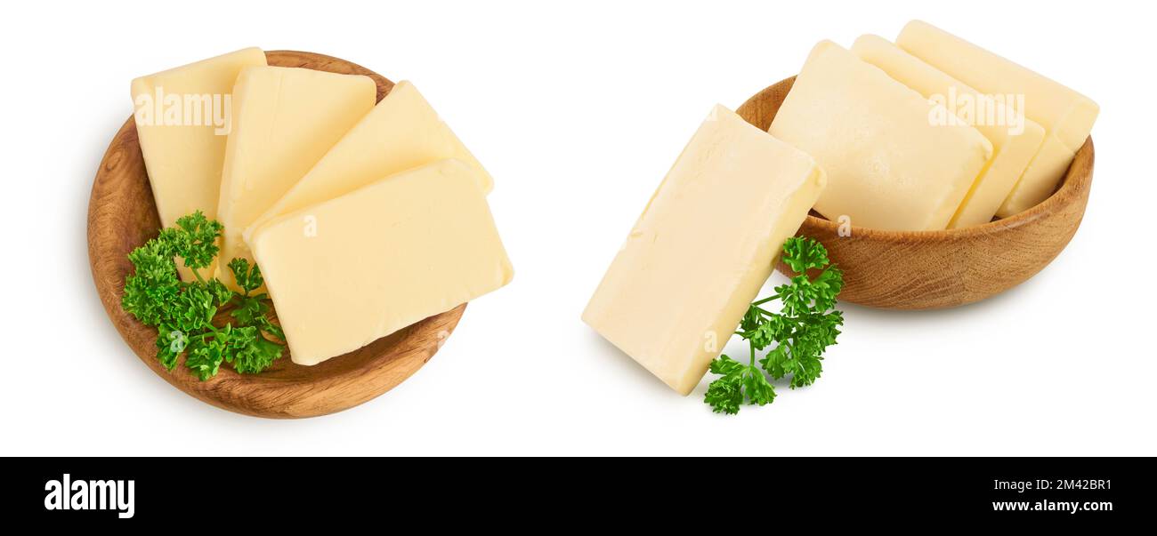 butter slices in wooden bowl isolated on white background with full ...