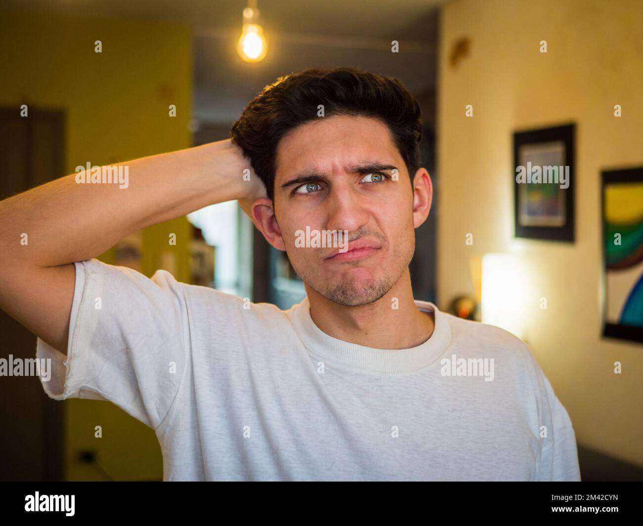 Confused man house hi-res stock photography and images - Alamy