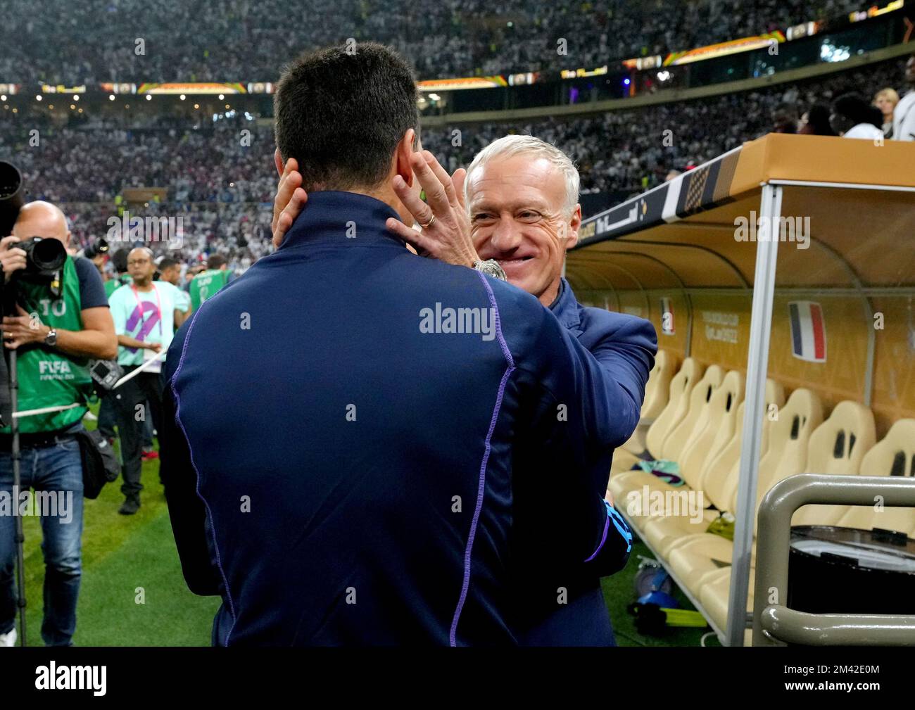 France manager Didier Deschamps (right) greets Argentina manager Lionel ...