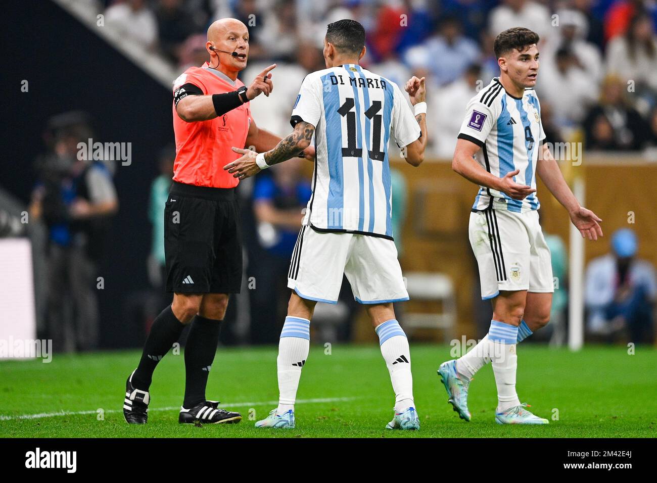 LUSAIL CITY, QATAR - DECEMBER 18: Referee Szymon Marciniak discusses ...