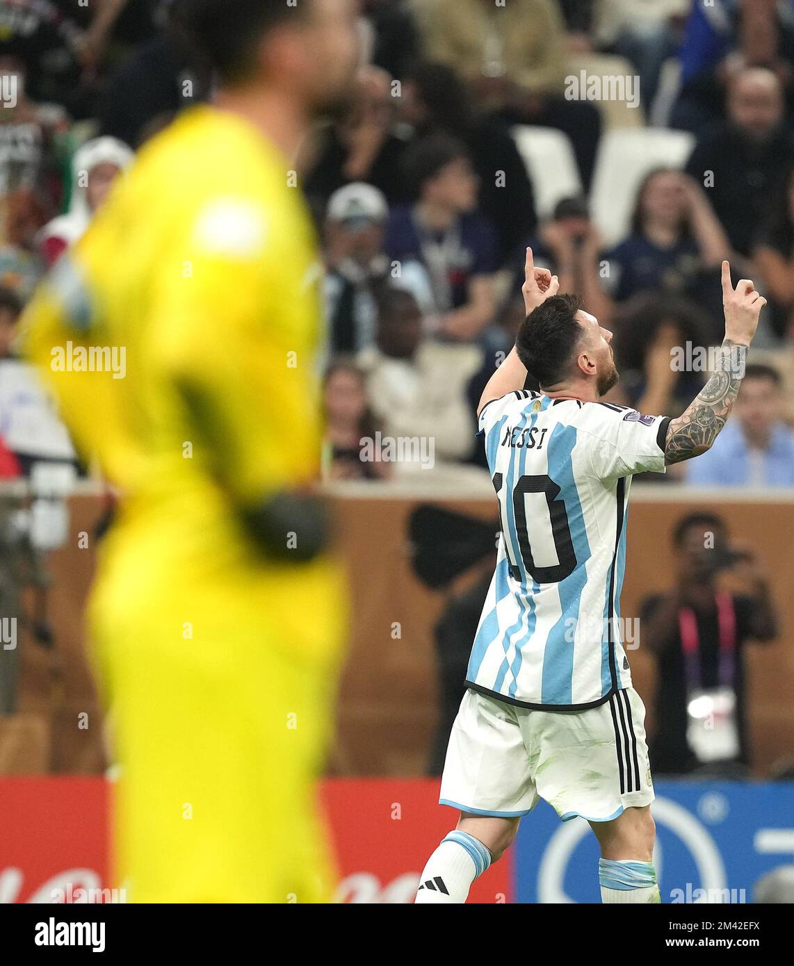 Argentina's Lionel Messi (right) celebrates scoring their side's first ...