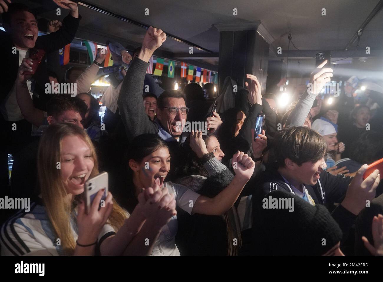Argentina fans at Moo Cantina in Pimlico, London celebrate their first ...