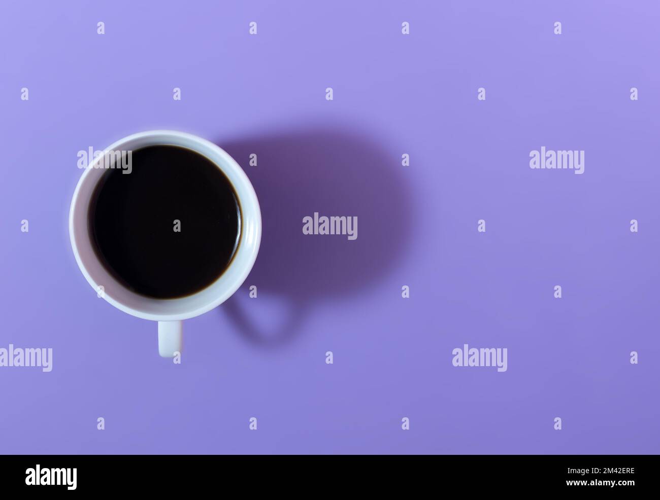 Cup of coffee for the menu. Lilac background Stock Photo - Alamy