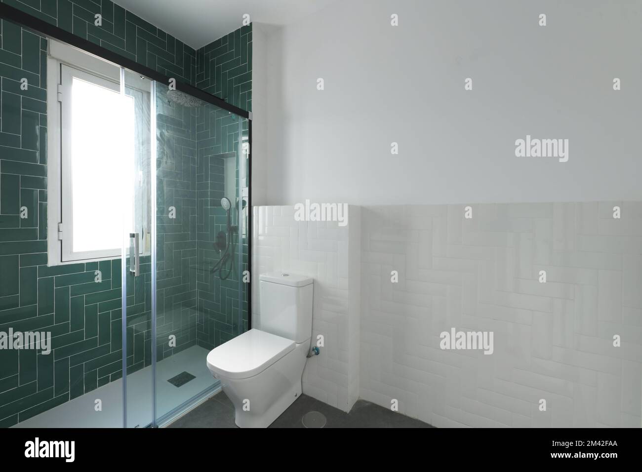 Contemporary designed toilet with white porcelain sanitary ware with ...