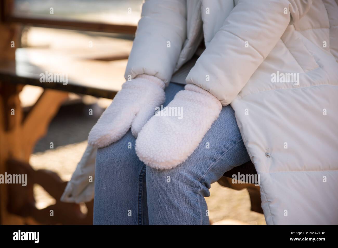 white mittens on the hands. girl in gloves Stock Photo - Alamy