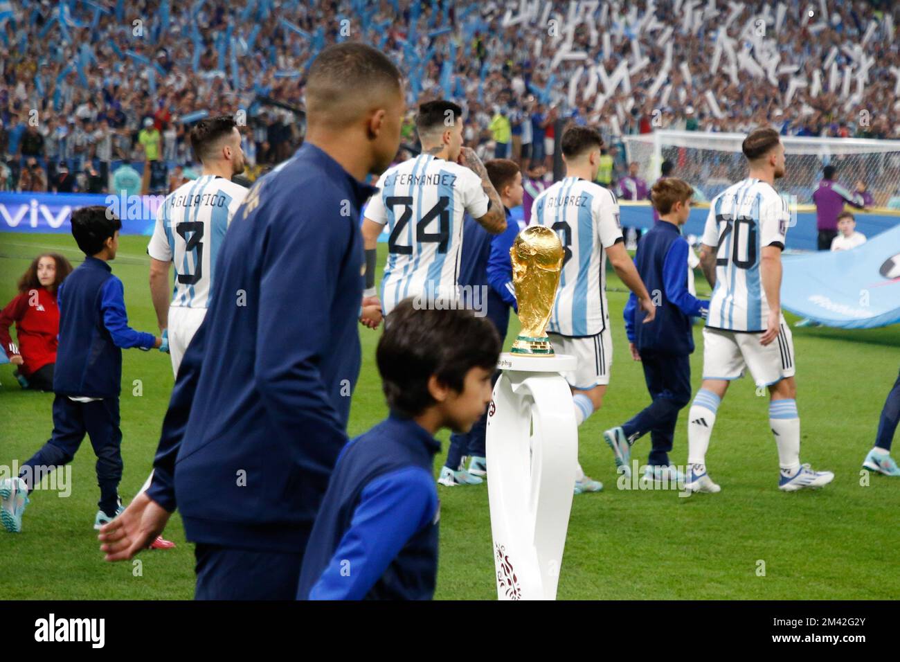 Doha, Qatar. 18th Dec, 2022. The World Cup Trophy is put on display on ...