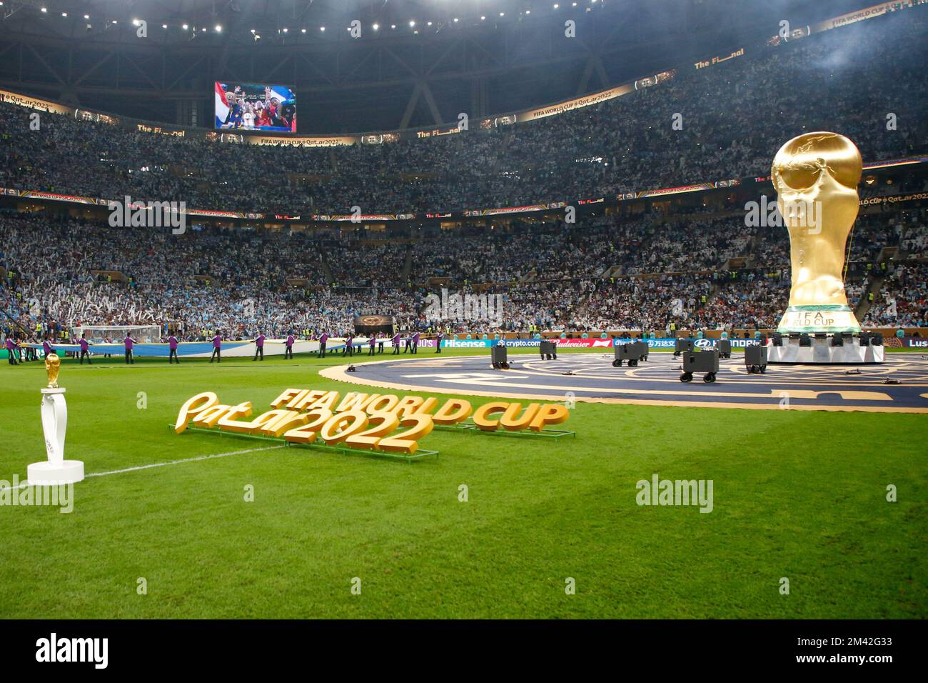 Doha, Qatar. 18th Dec, 2022. The World Cup Trophy is put on display on ...
