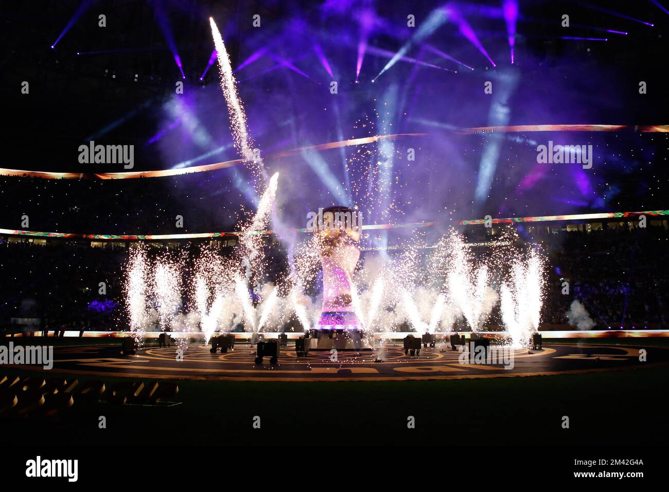 Doha, Qatar. 18th Dec, 2022. The World Cup Trophy is put on display on ...