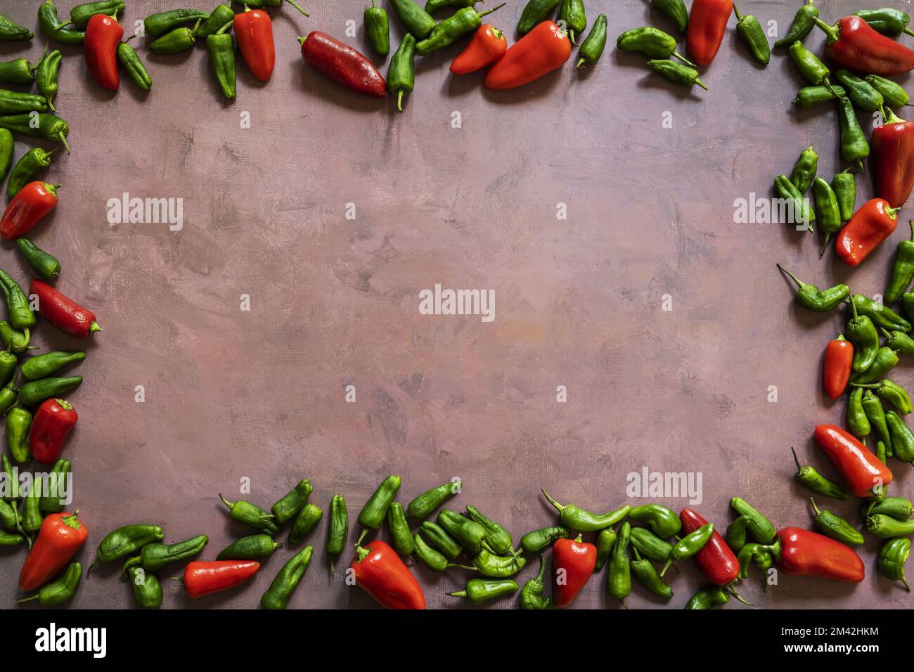 A handful of green Padrón peppers and other red ones to fry and ...