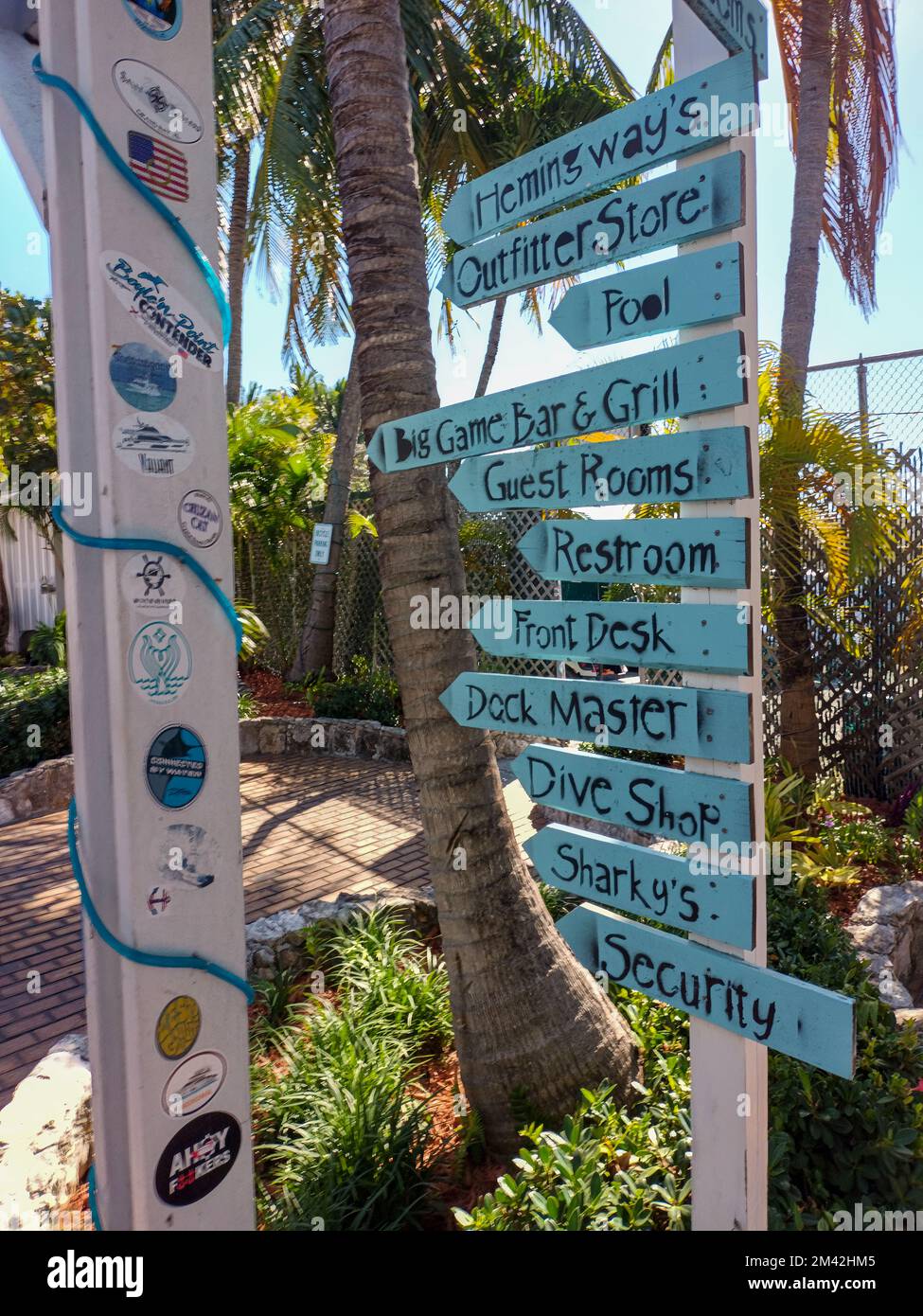 A signpost in the Big Game Club in North Bimini, Bahamas Stock Photo ...