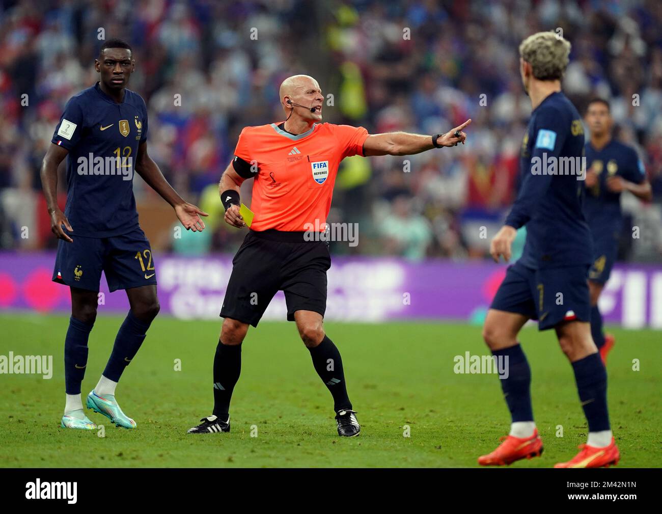 Referee Szymon Marciniak (centre) during the FIFA World Cup final at ...