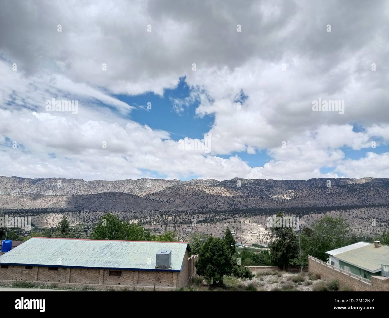 The beautiful landscape of Ziarat mountains with sparse vegetation ...