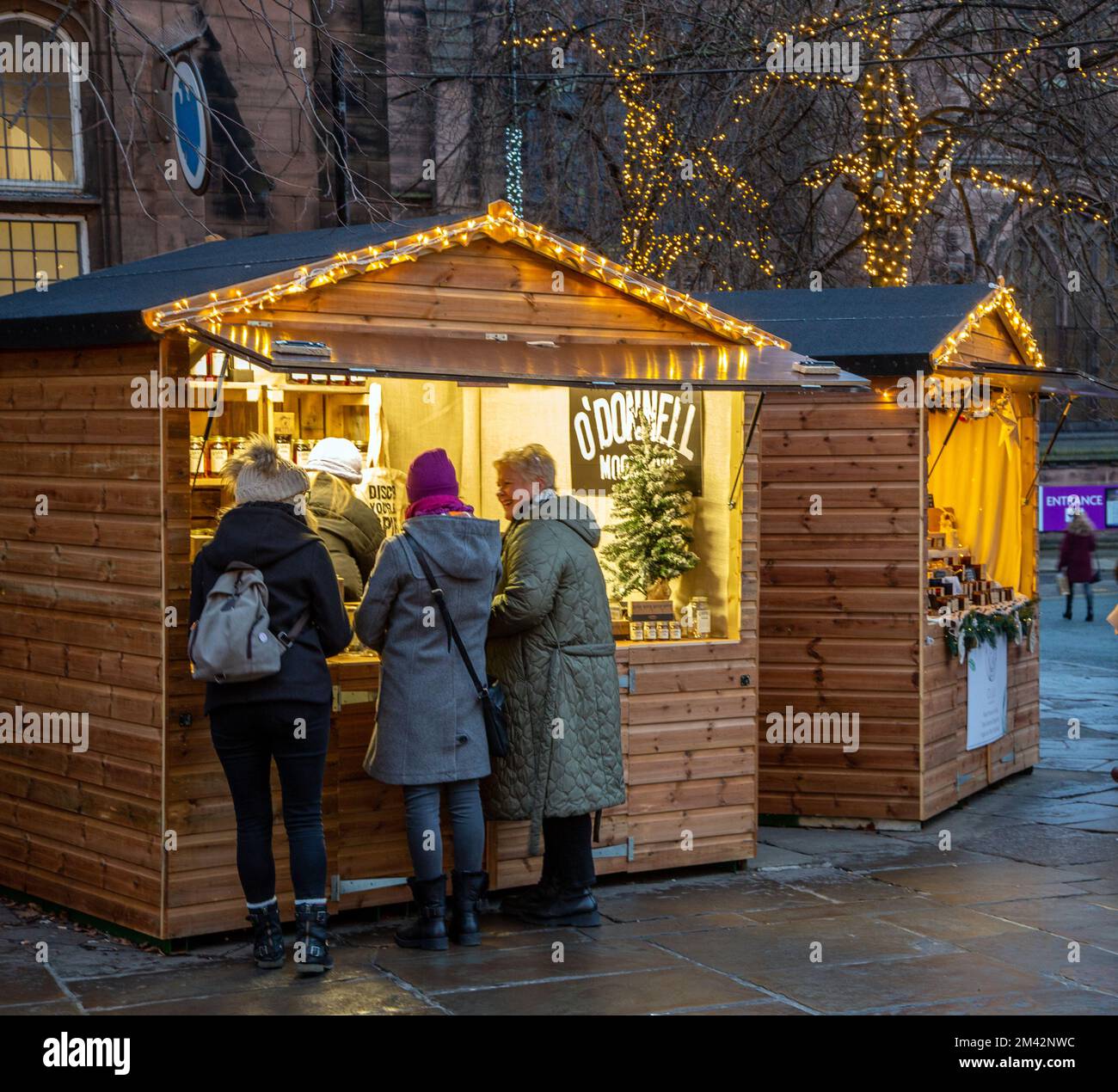 People shopping at Christmas street market in the Cheshire city of ...