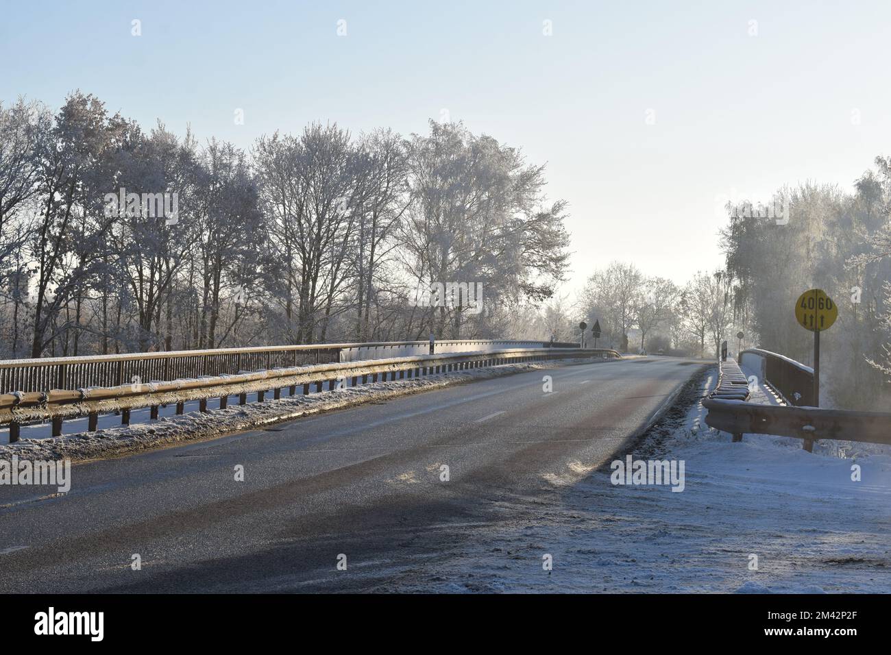 bridge across the Autobahn in winter with snow Stock Photo - Alamy